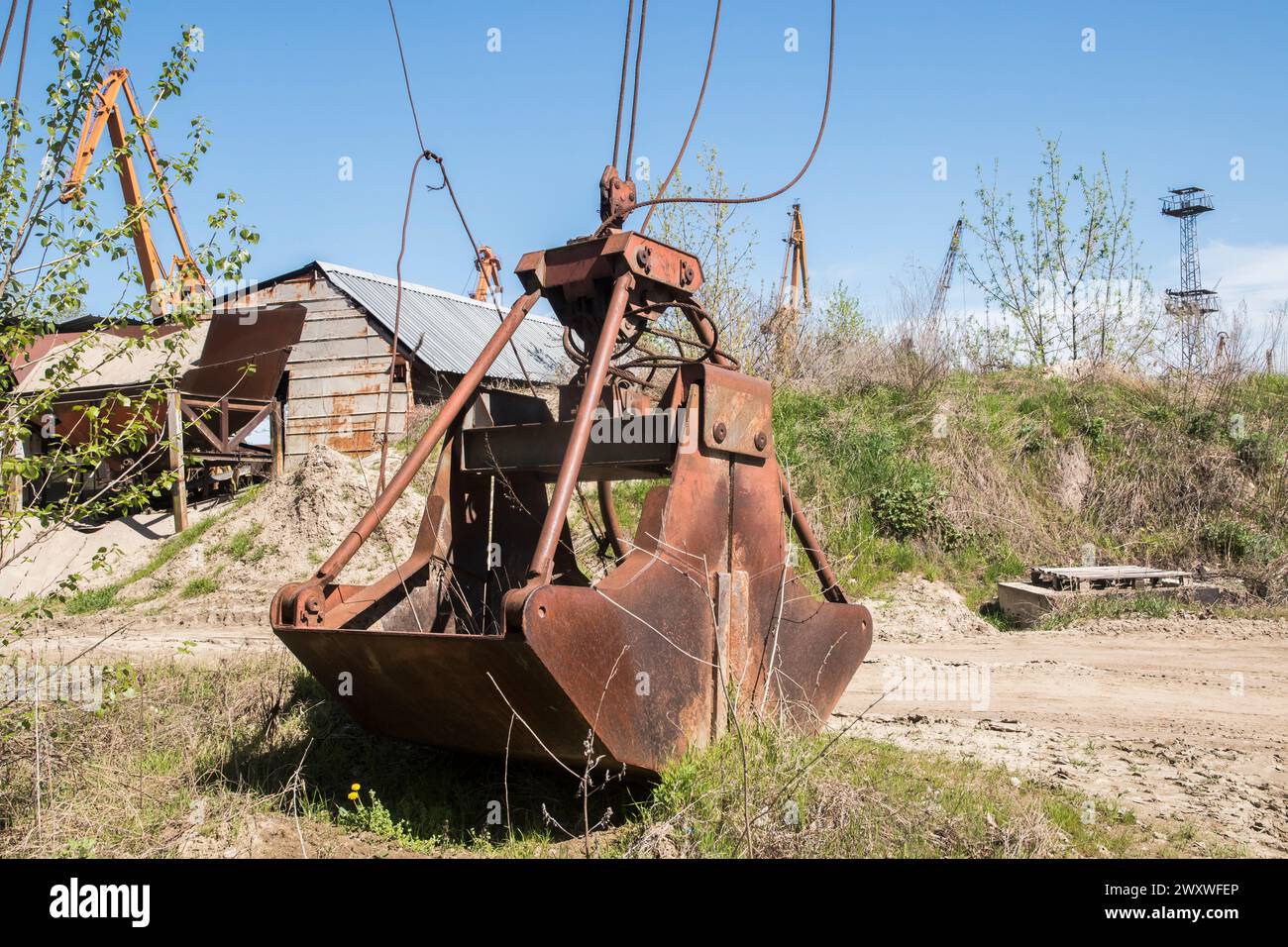 Old obsolete industrial facility for gravel pit sorting Stock Photo - Alamy