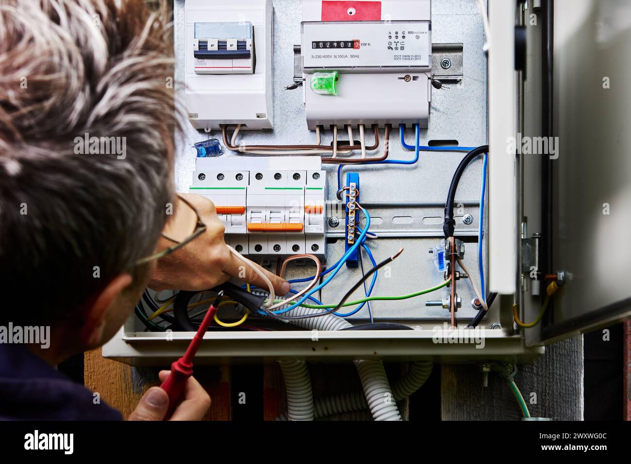 External distribution board on wood wall of rural house, installer ...