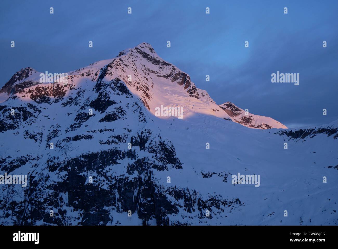 Alpenglow on Mount Butters, Selkirk Mountains Battle Range, viewed from ...