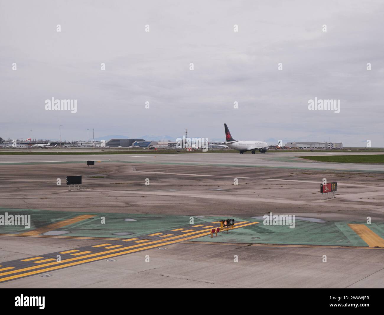 Air Canada passenger jet accelerating down runway for takeoff Stock ...