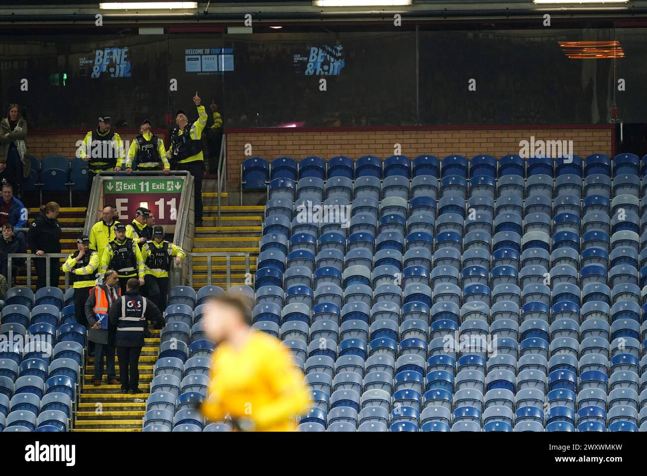 Police inspect an evacuated section of the stadium due to a safety ...