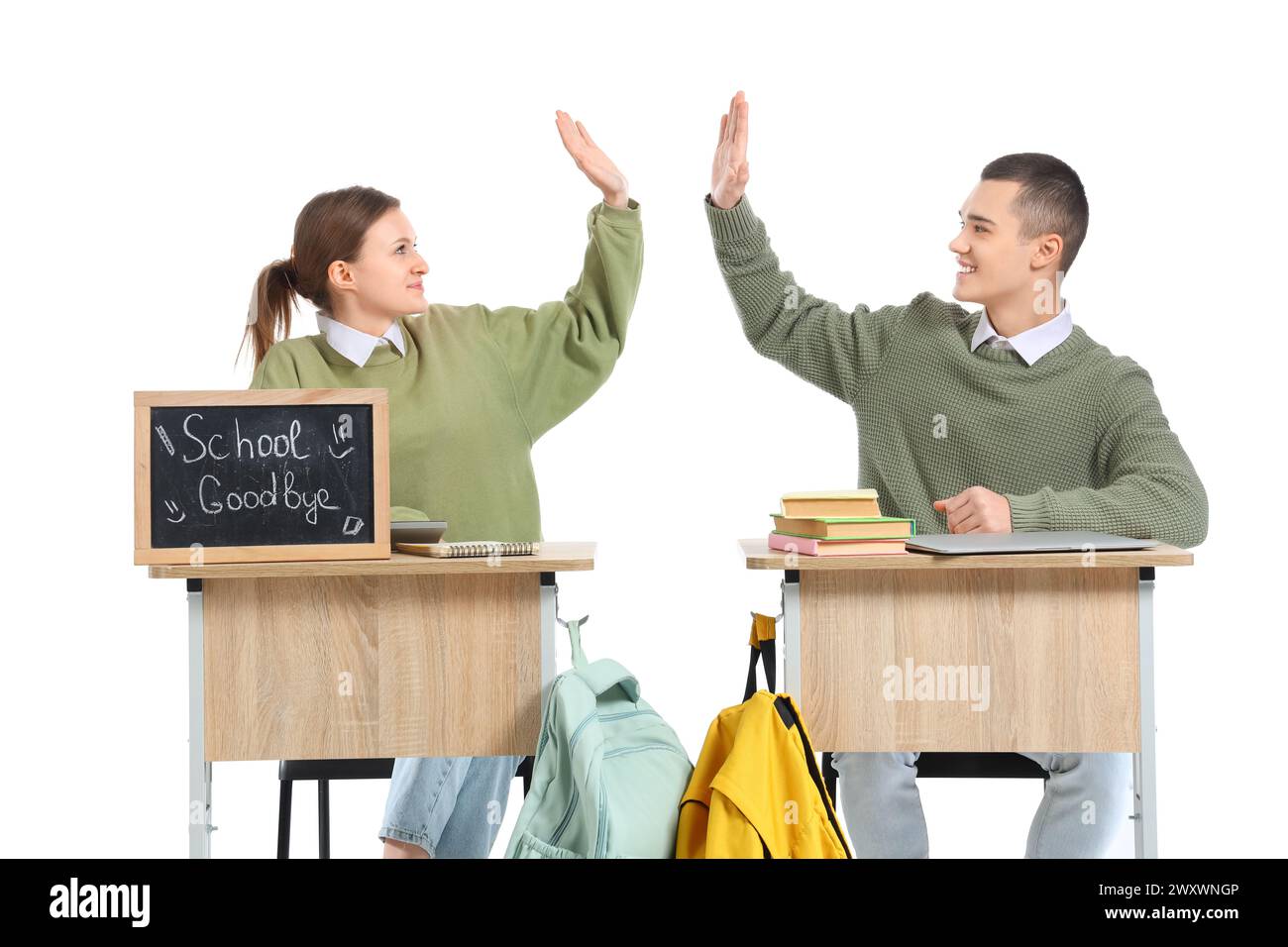 Students at school desks with chalkboard with text SCHOOL GOODBYE ...