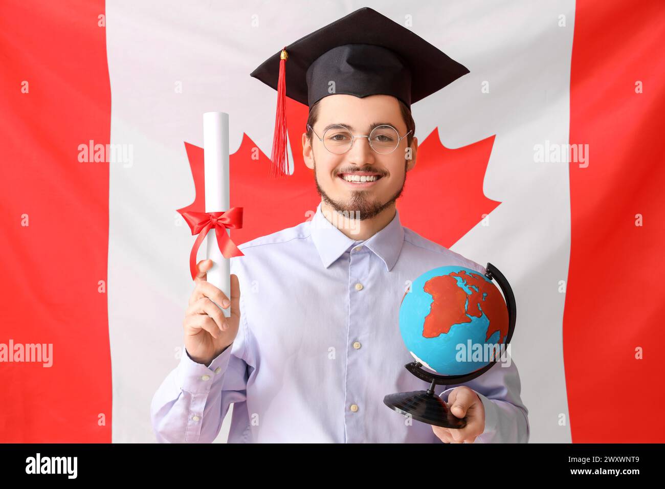 Canada on globe flag hi-res stock photography and images - Alamy