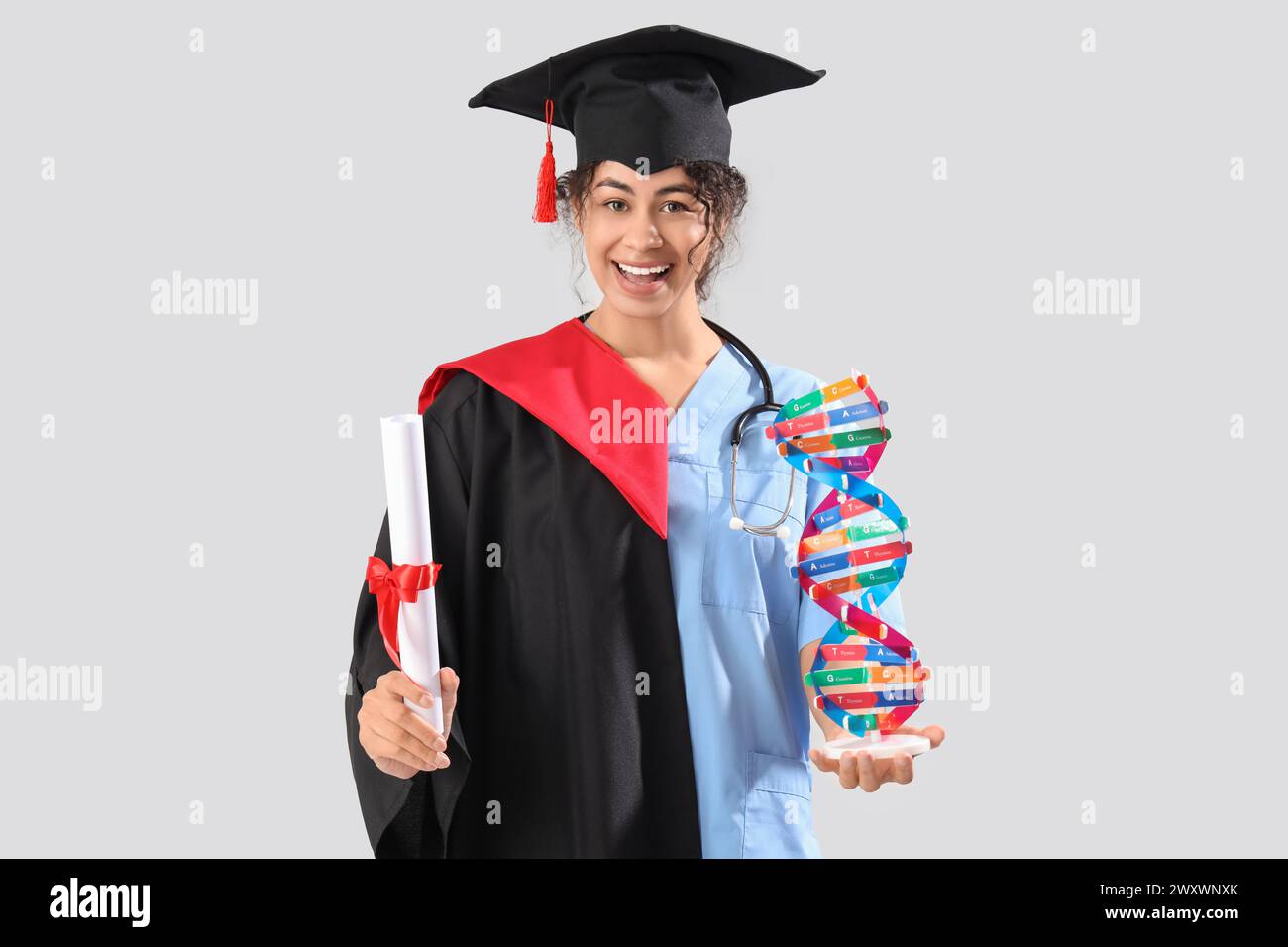 African-American female medical graduate student with diploma and DNA ...
