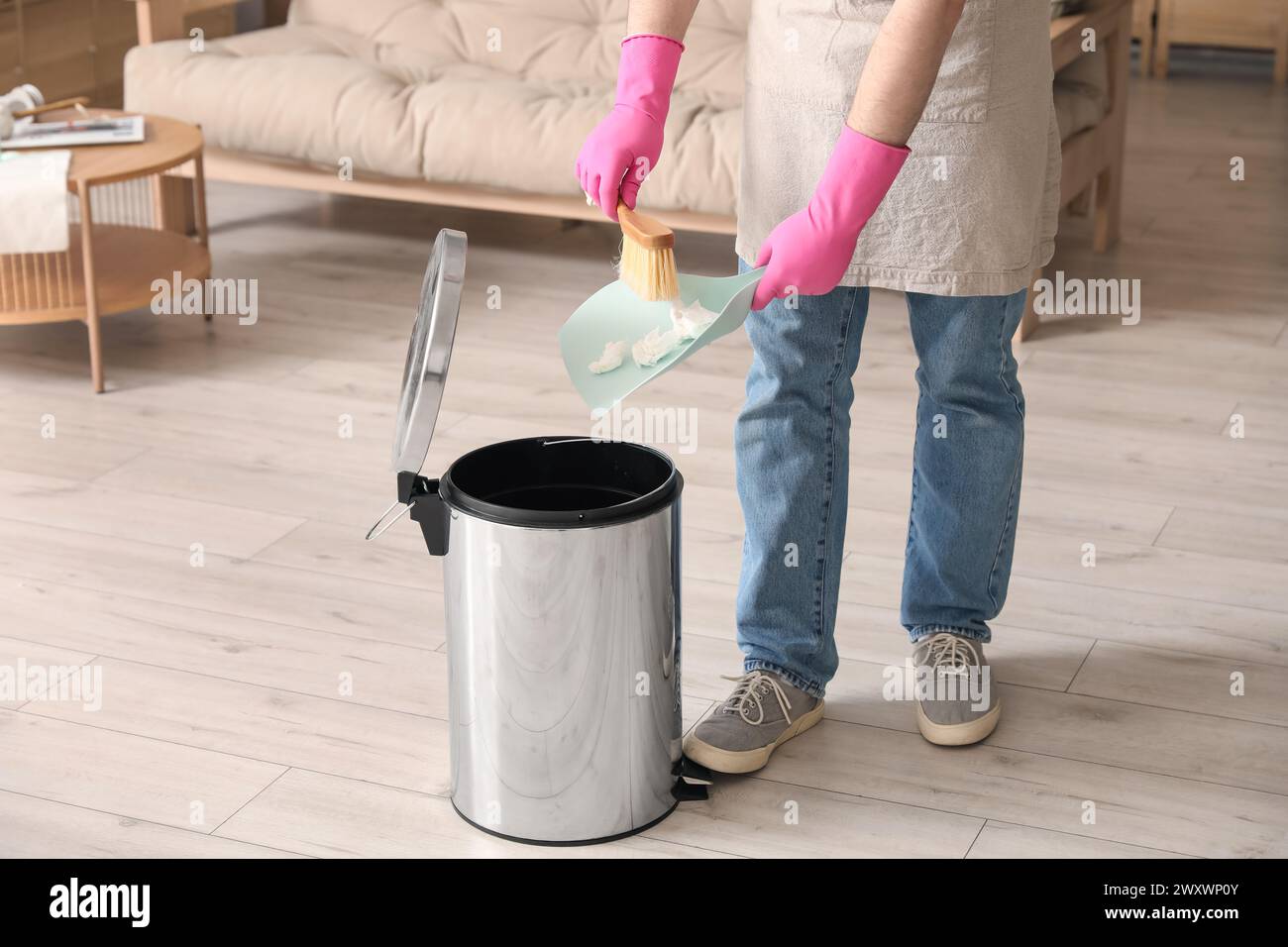 Man throwing rubbish in bin hi-res stock photography and images - Alamy