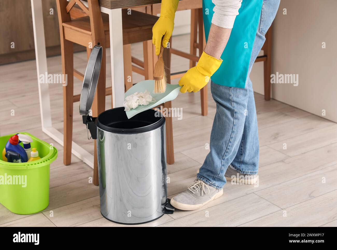 Man throwing rubbish in bin hi-res stock photography and images - Alamy