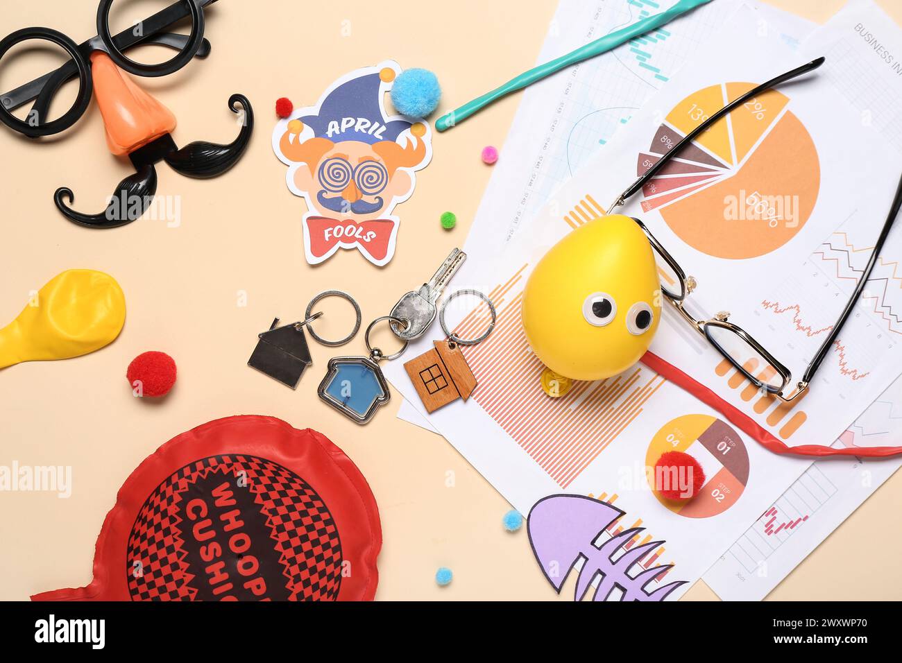 Composition with key chains, business charts and party decor on color ...