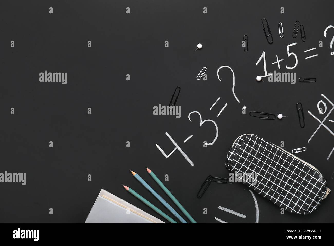 Blackboard with drawing and different stationery. End of school. Top ...