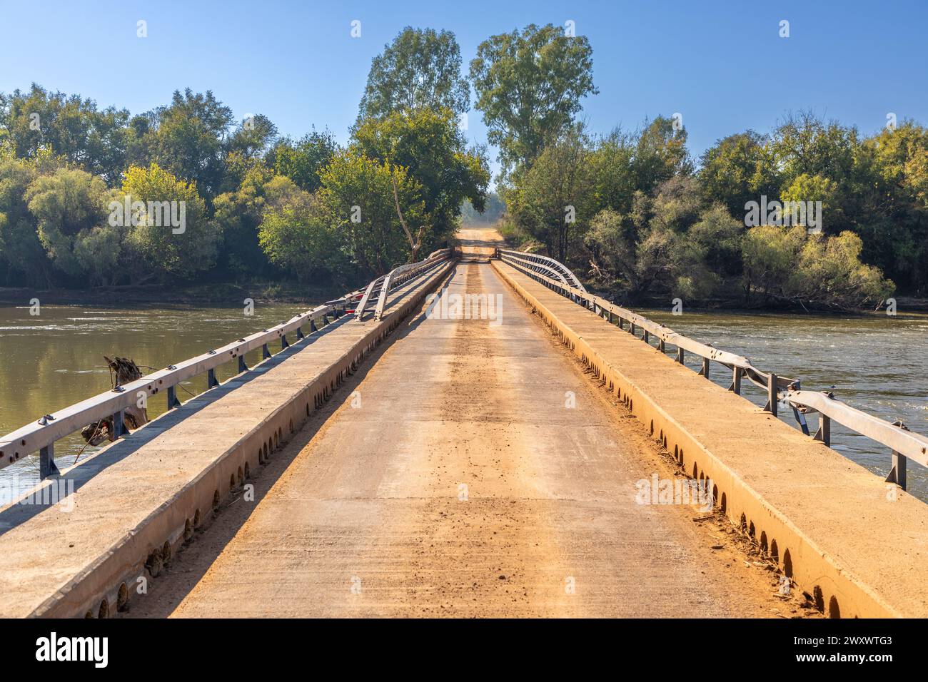 Low level single lane concrete bridge over the Vaal river in South ...