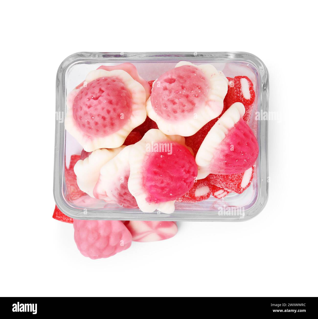Yummy candies in glass bowl isolated on white, top view Stock Photo - Alamy
