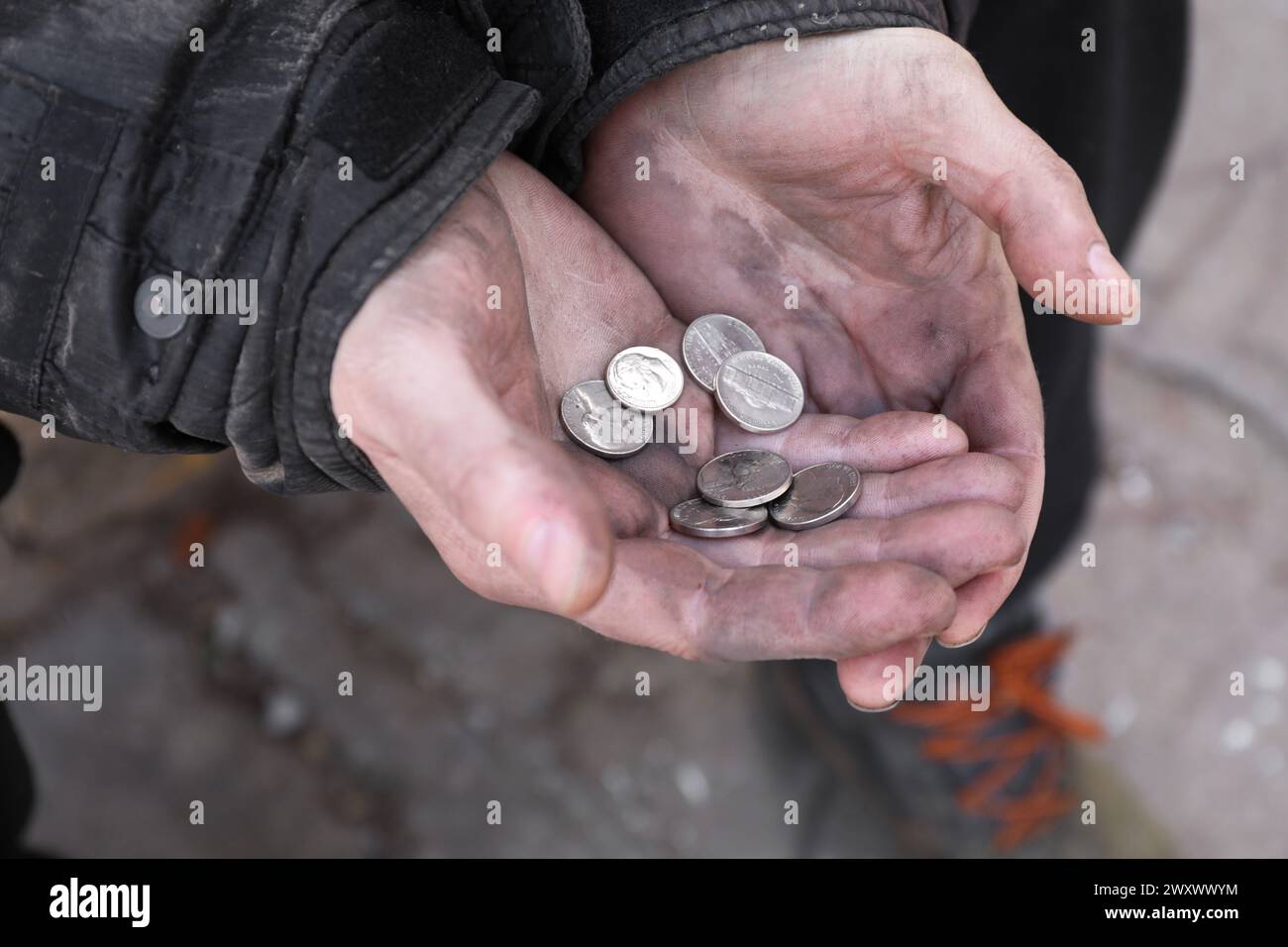 Homeless man counting money hi-res stock photography and images - Alamy
