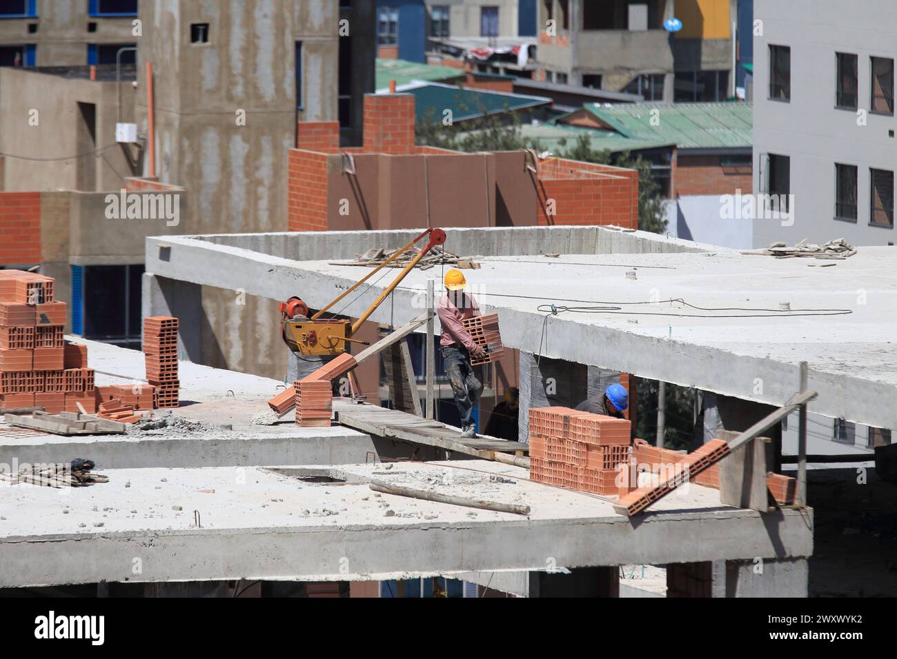 Bogota; Colombia. 26-01-2024- Construction workers meet during a ...