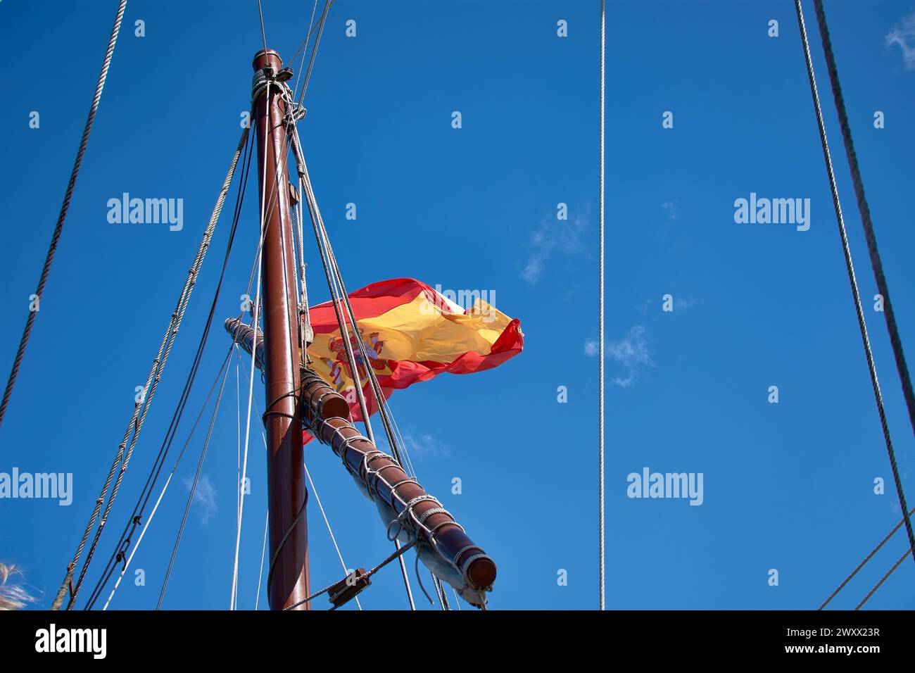 Mast with the flag of Spain of the replica of the caravel Santa Maria ...