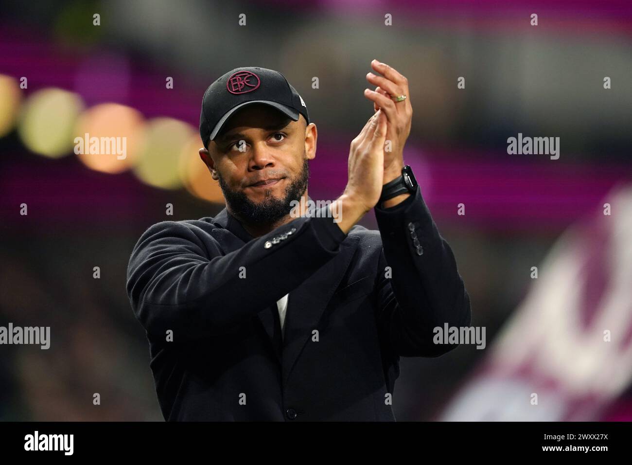 Burnley manager Vincent Kompany applauds the fans following the Premier ...