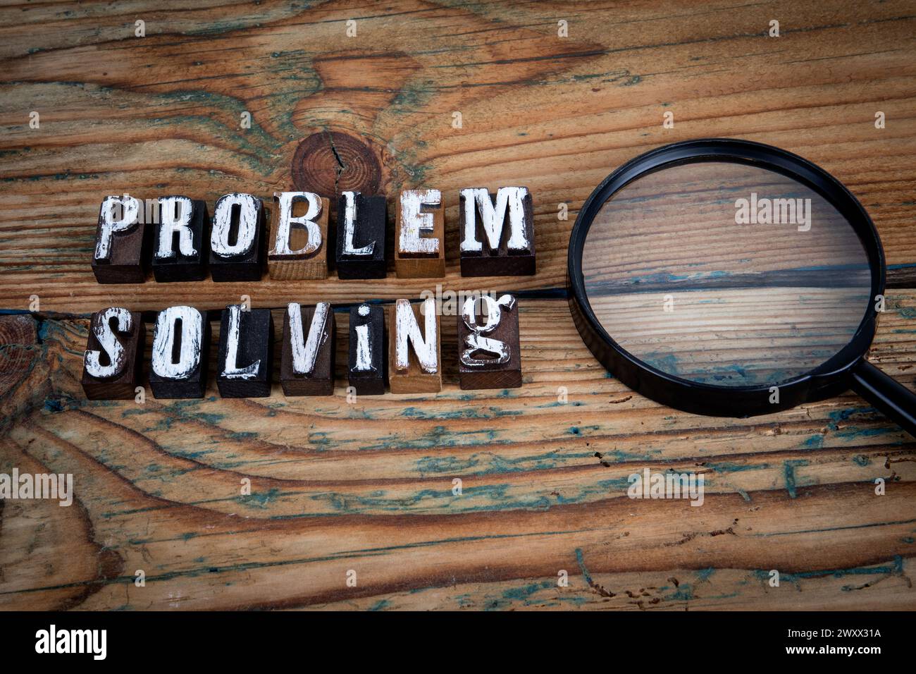 PROBLEM SOLVING. Alphabet letters on wood texture background Stock ...