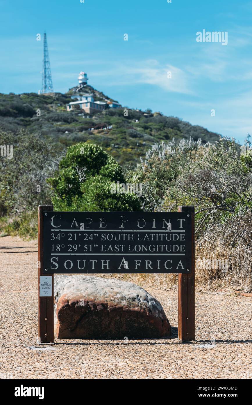 The sign marks the geographical coordinates of Cape Point, with the ...