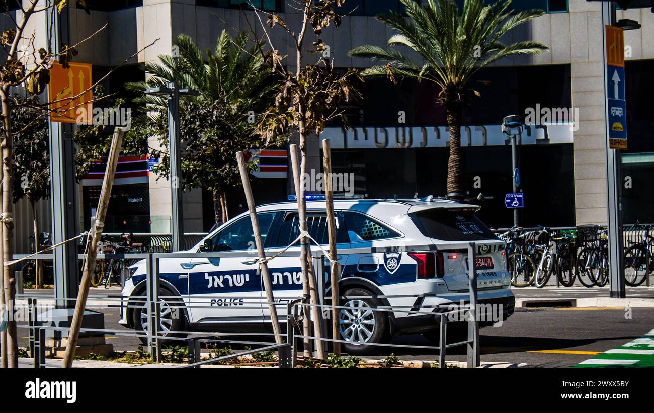 Tel Aviv, Israel, February 26, 2024 Israel police car driving in the ...