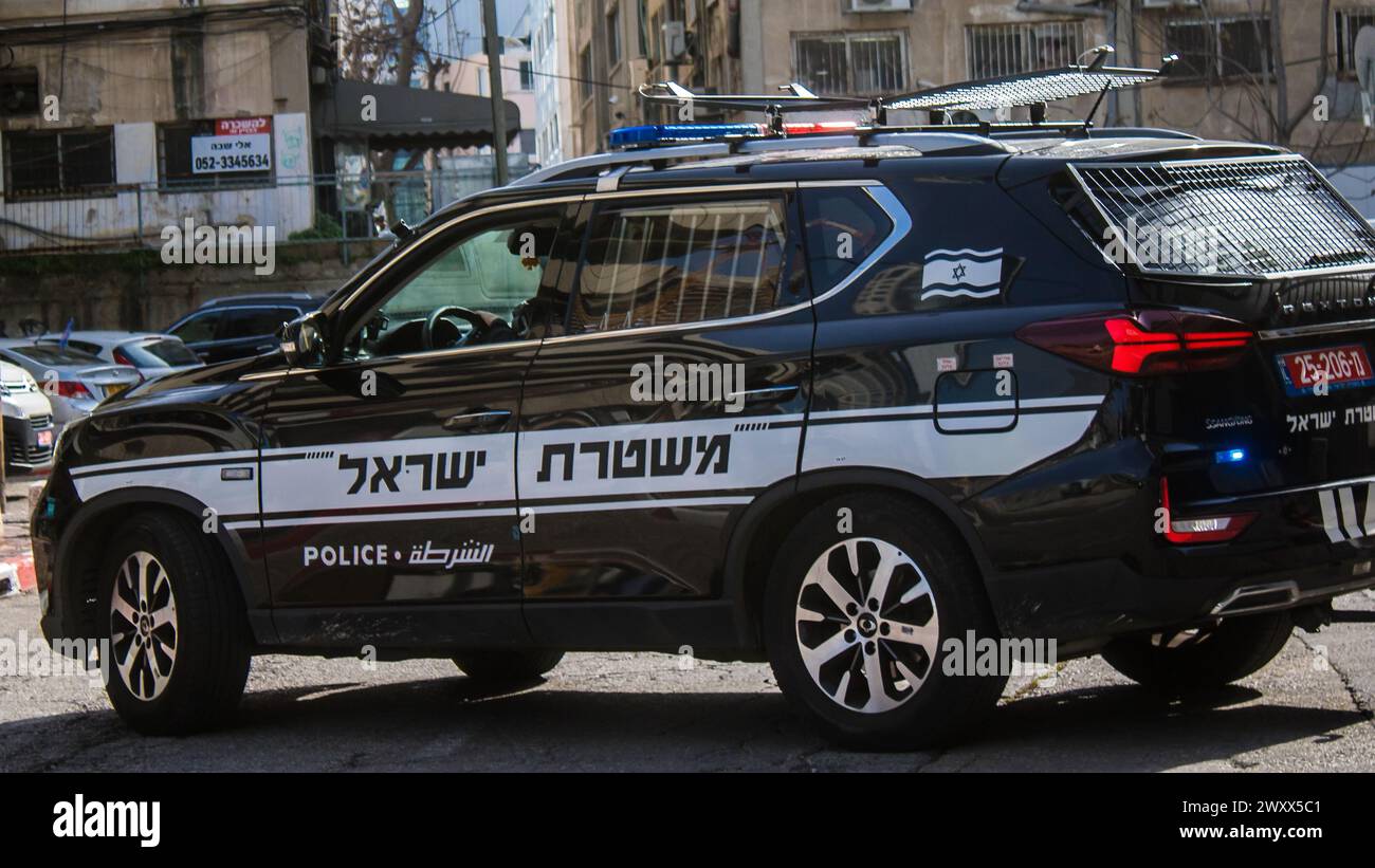 Tel Aviv, Israel, February 26, 2024 Israel police car driving in the ...