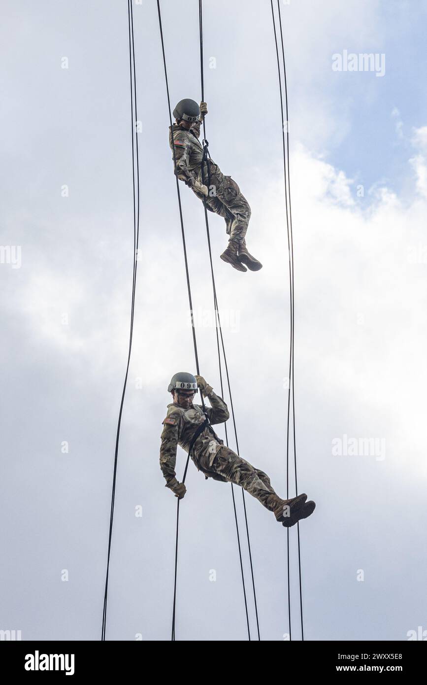 U.S. Army Soldiers from 25th Infantry Division, repel from a UH-60 ...
