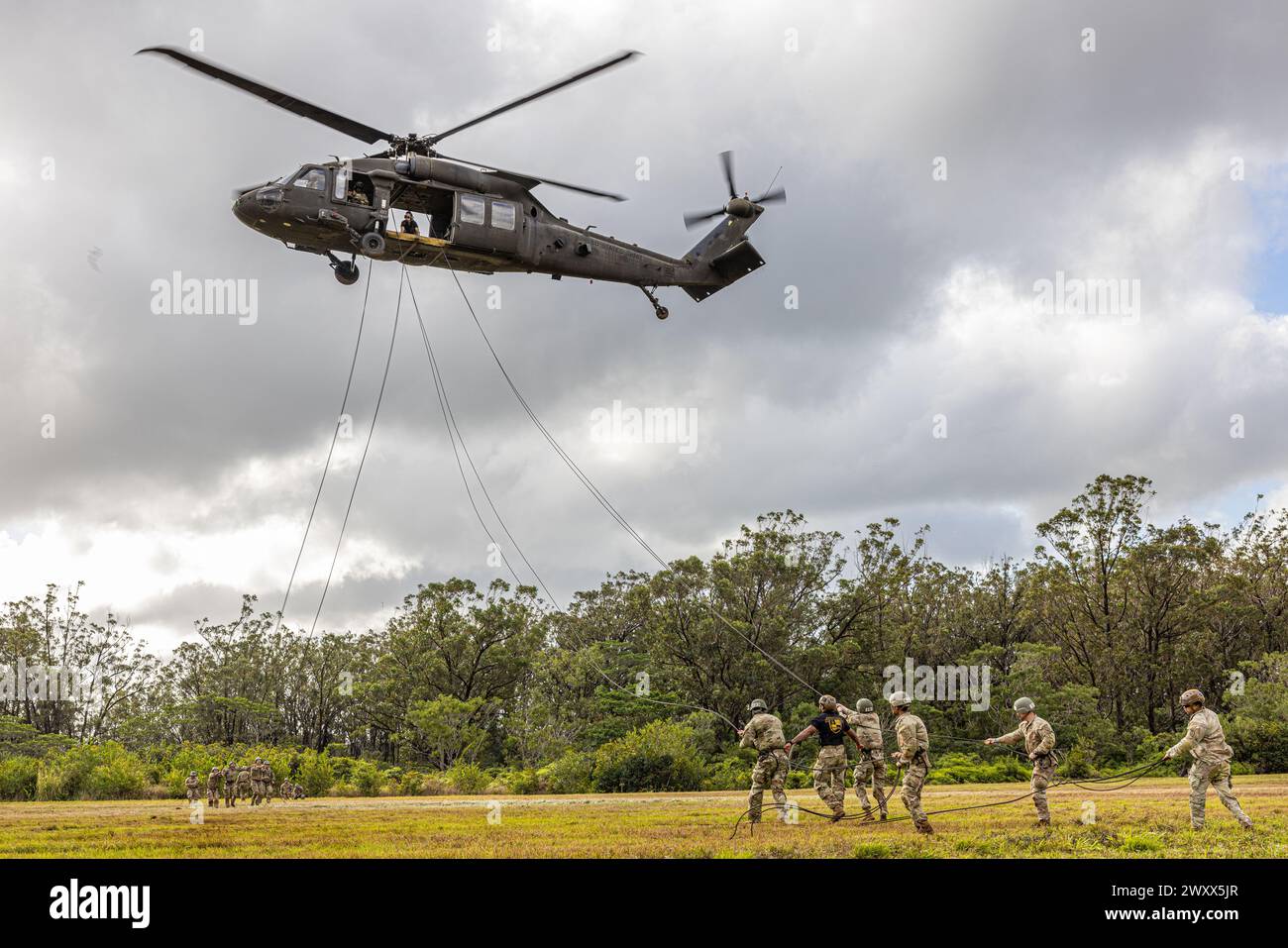 U.S. Army Soldiers from 25th Infantry Division, repel from a UH-60 ...