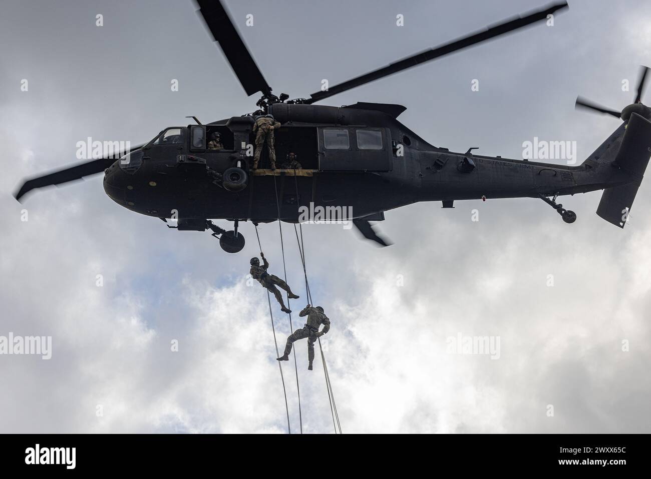 U.S. Army Soldiers from 25th Infantry Division, repel from a UH-60 ...