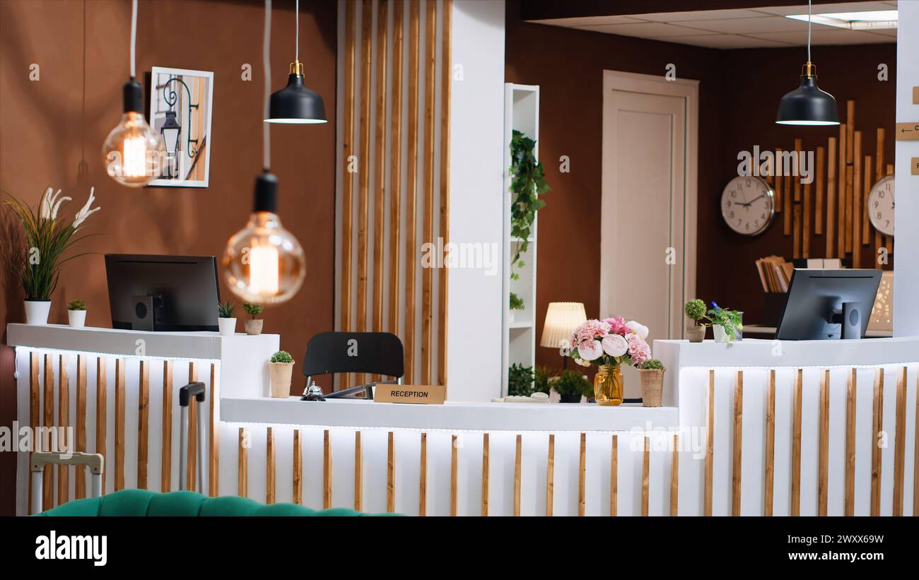 Empty stylish hotel entrance ready to welcome clients at reception ...