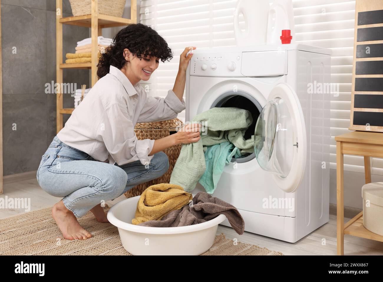 Woman taking cleaning cloth hi-res stock photography and images - Alamy