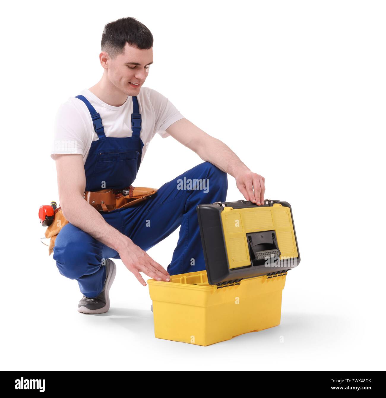 Professional repairman with tool box on white background Stock Photo ...