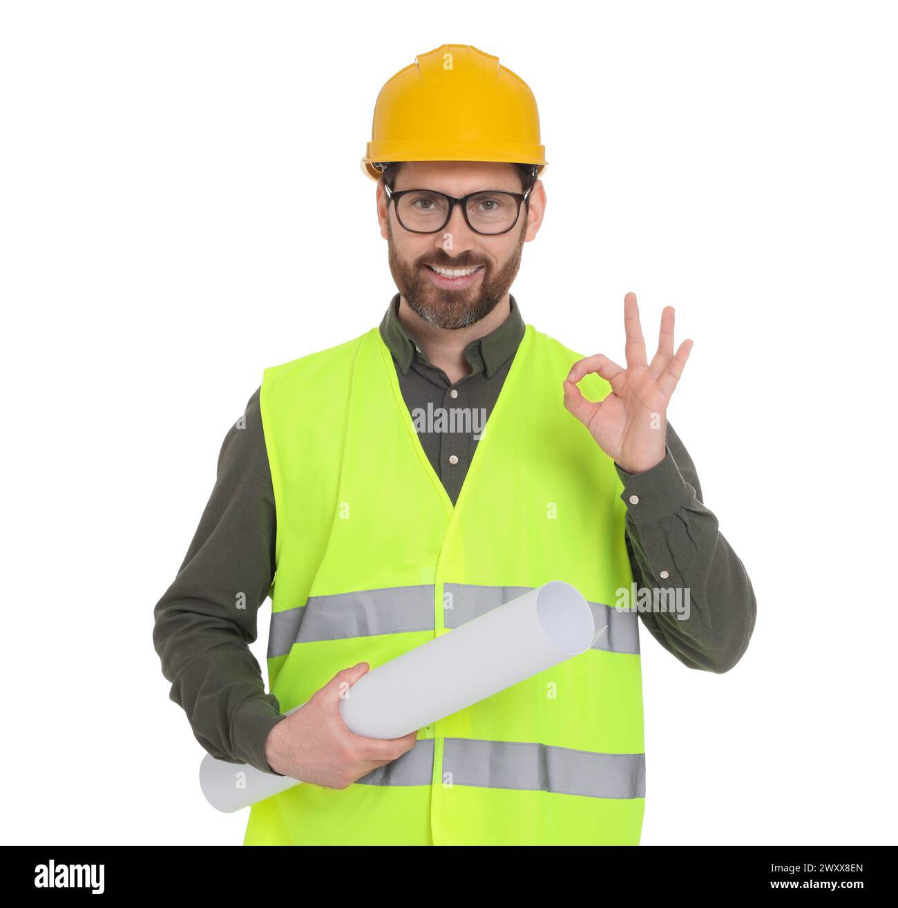 Architect in hard hat with draft showing OK gesture on white background ...
