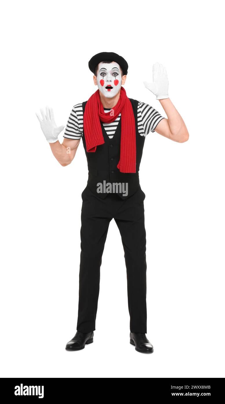 Mime artist making shocked face on white background Stock Photo - Alamy