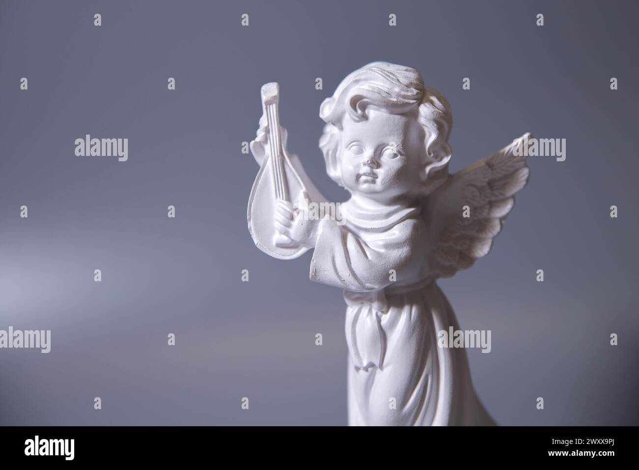 angel on gray background. concept Stock Photo - Alamy