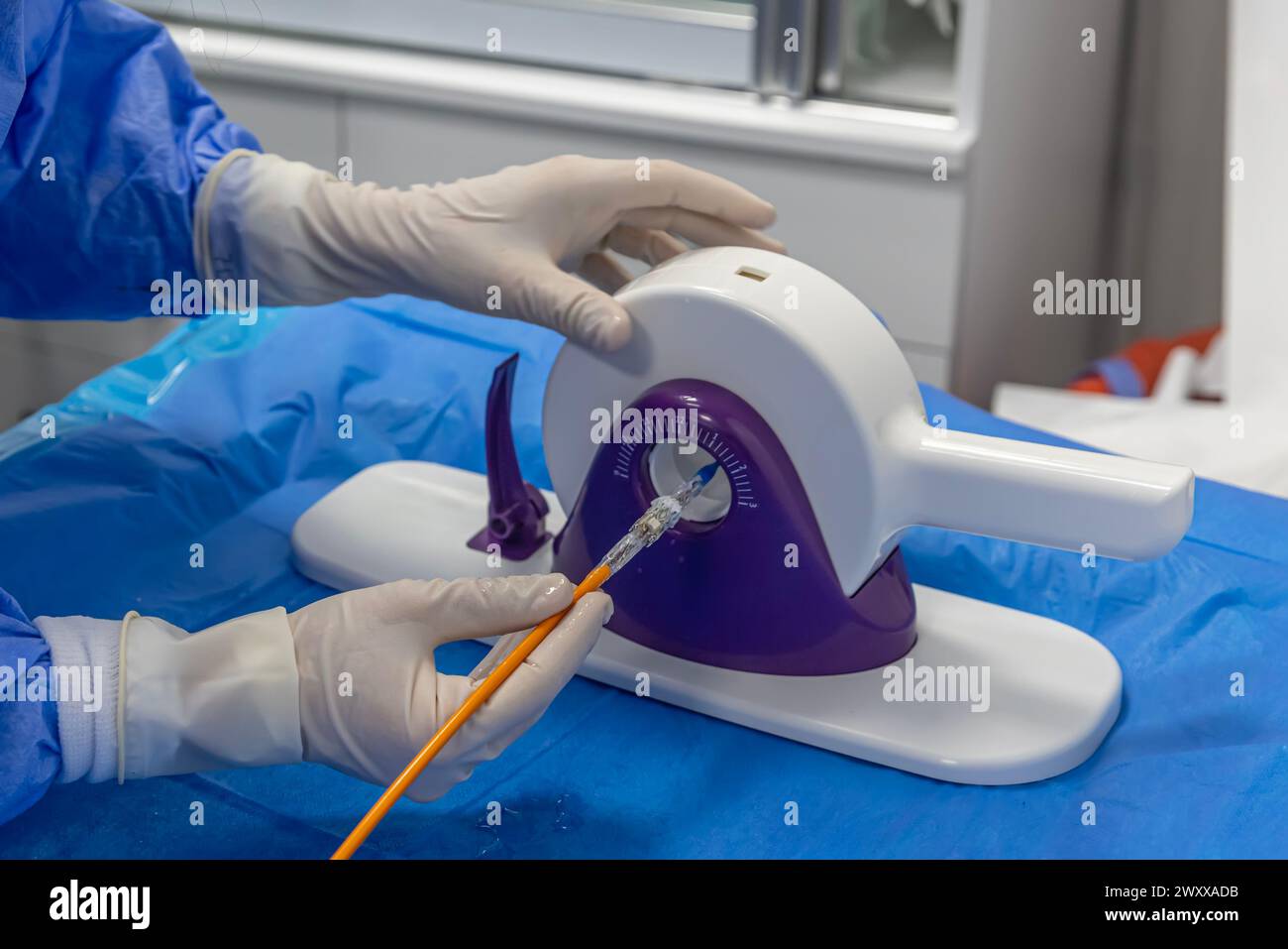 Disposable heart valve crimping tool. In the operating room, the doctor ...