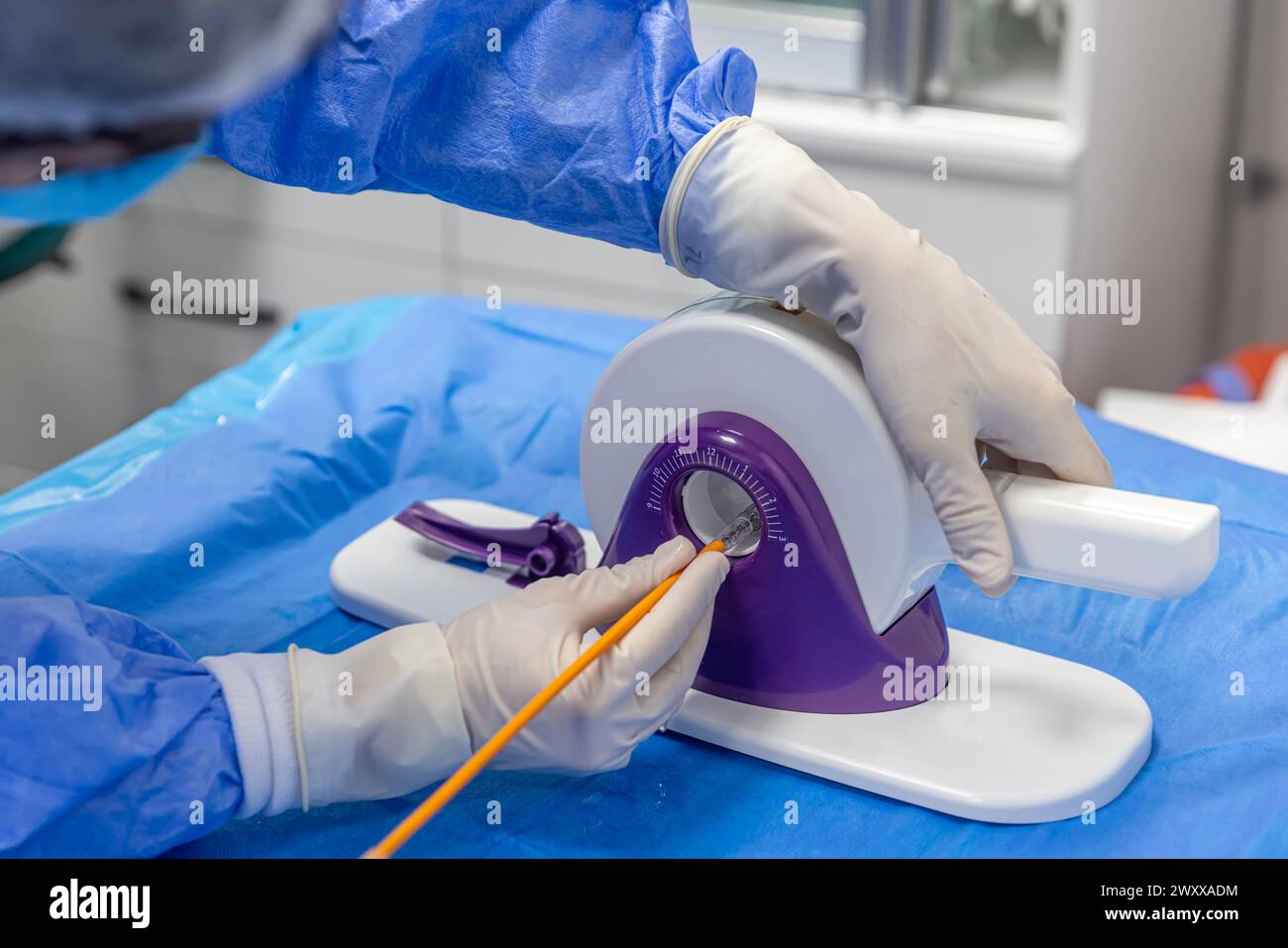 Disposable heart valve crimping tool. In the operating room, the doctor ...