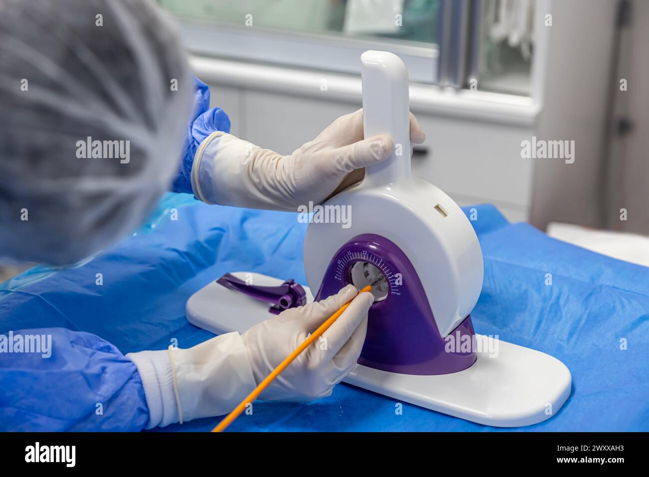Disposable heart valve crimping tool. In the operating room, the doctor ...