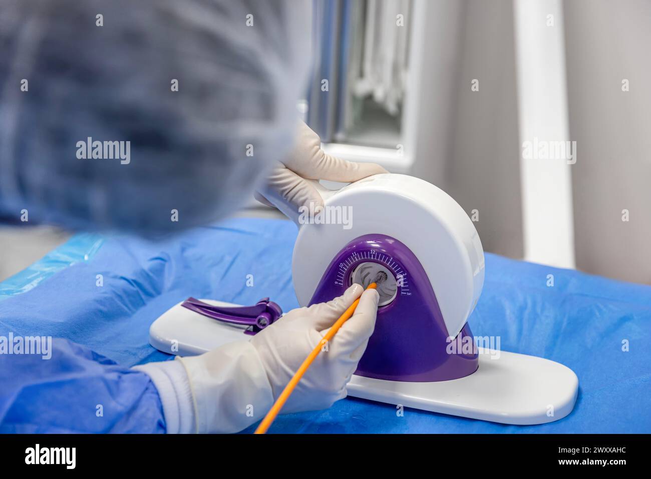 Disposable heart valve crimping tool. In the operating room, the doctor ...