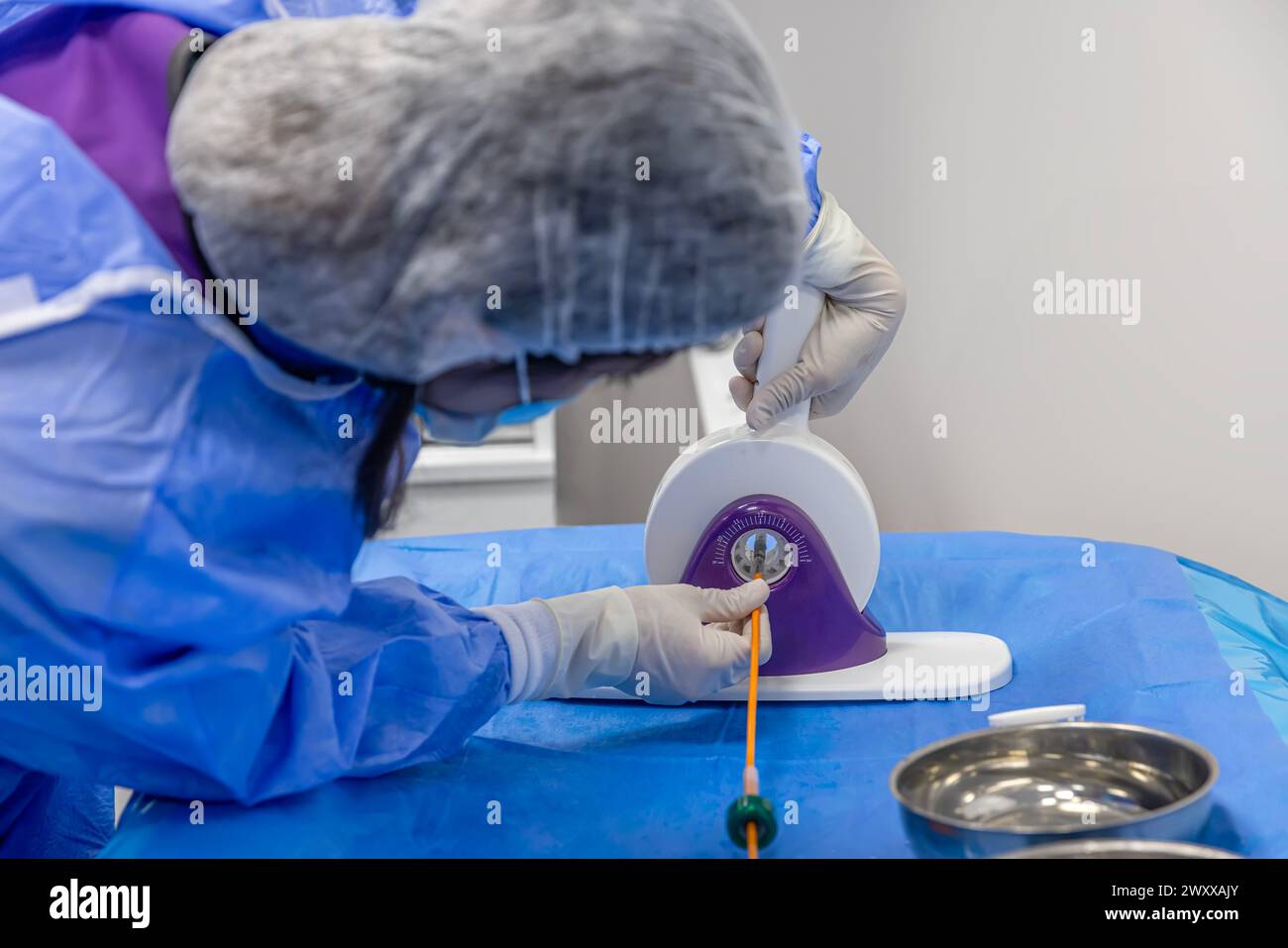 Disposable heart valve crimping tool. In the operating room, the doctor ...