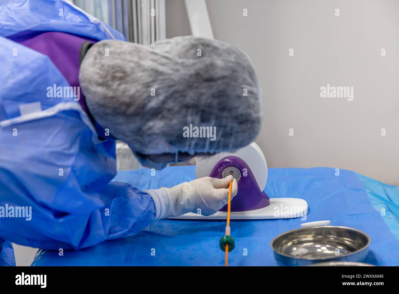 Disposable heart valve crimping tool. In the operating room, the doctor ...