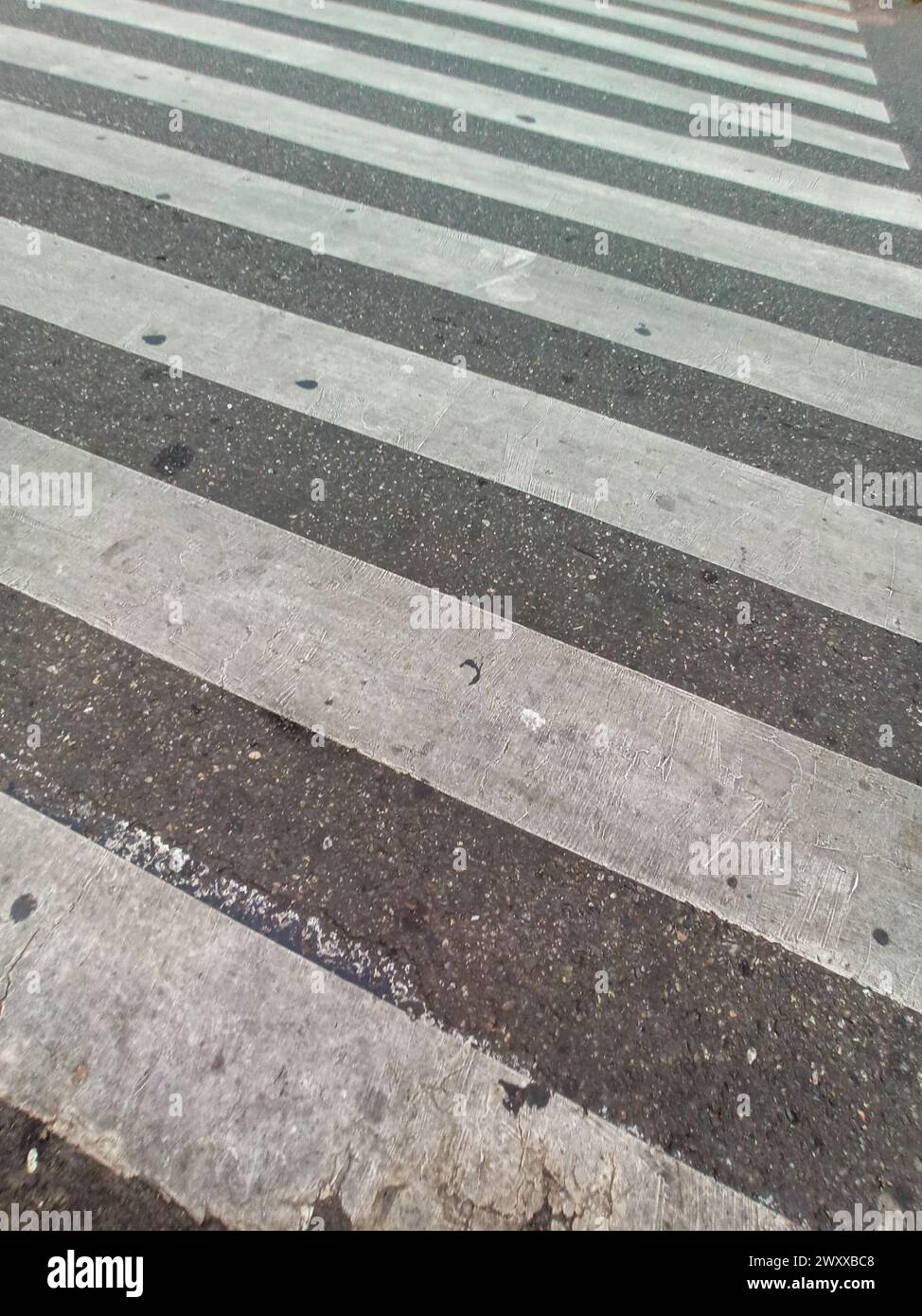 Crossing of road texture of pavement in perspective with white ...