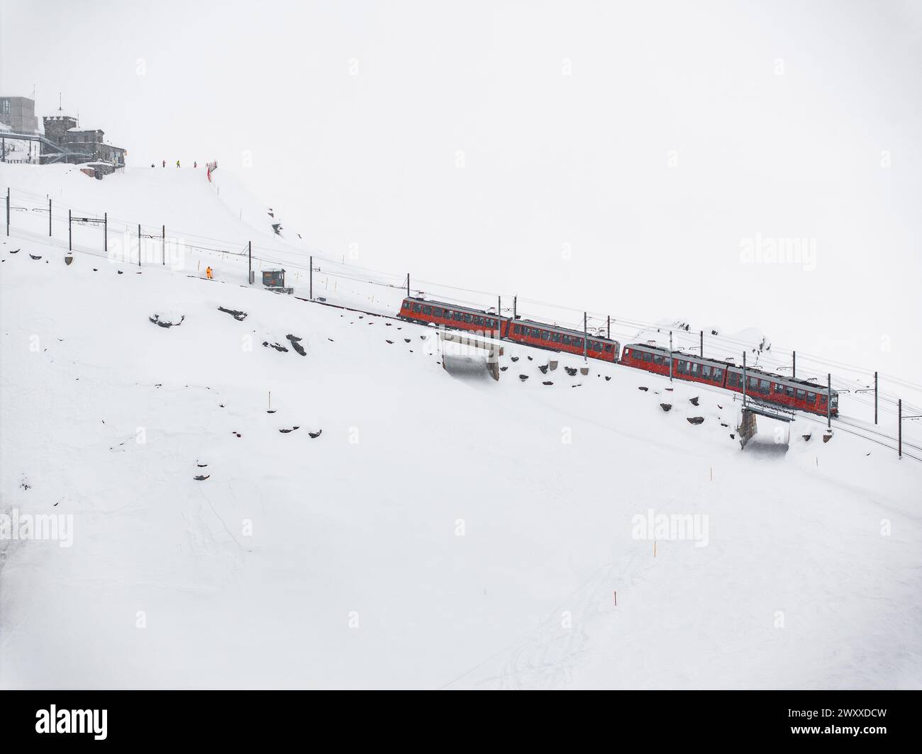 Aerial View of Red Train in Snowy Zermatt Ski Resort, Switzerland Stock ...