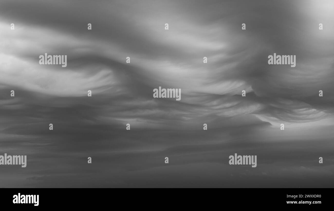 dramatic clouds that look like waves, monochrome Stock Photo - Alamy
