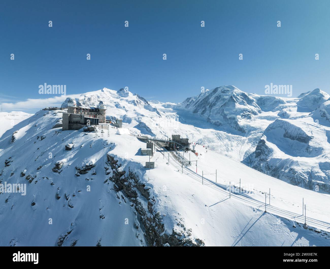 Aerial View of Snowy Peaks and Ski Resort Facilities, Zermatt ...