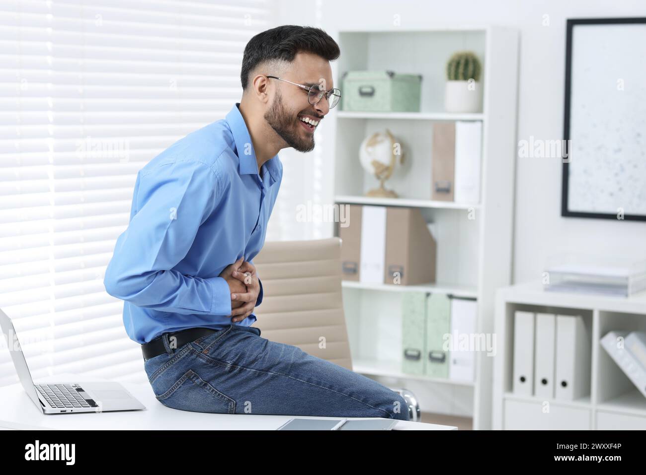 Joke laughing office interior hi-res stock photography and images - Alamy