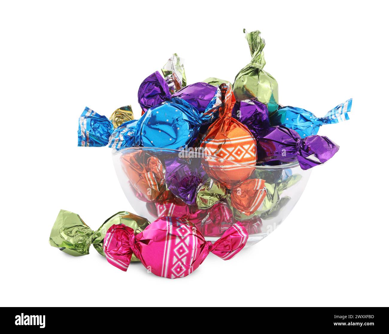 Bowl with sweet candies in colorful wrappers on white background Stock ...