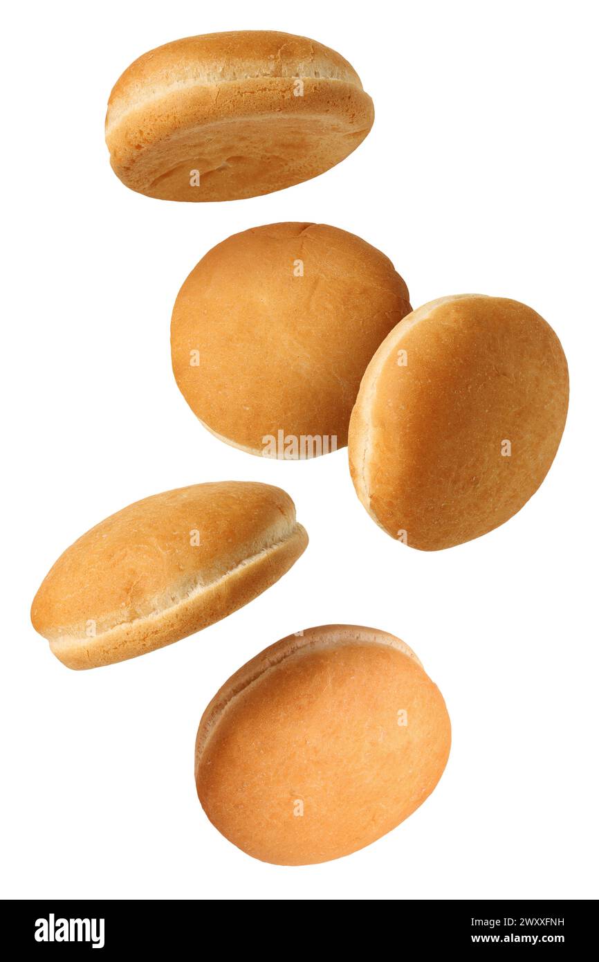 Fresh burger buns falling on white background Stock Photo - Alamy