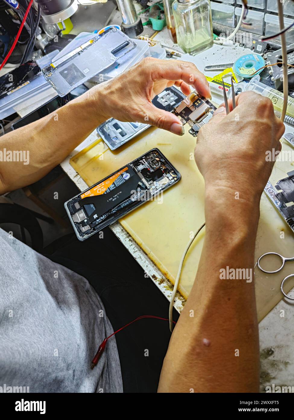 Perak,Malaysia. April 2,2024: Mobile technician inside his workshop ...