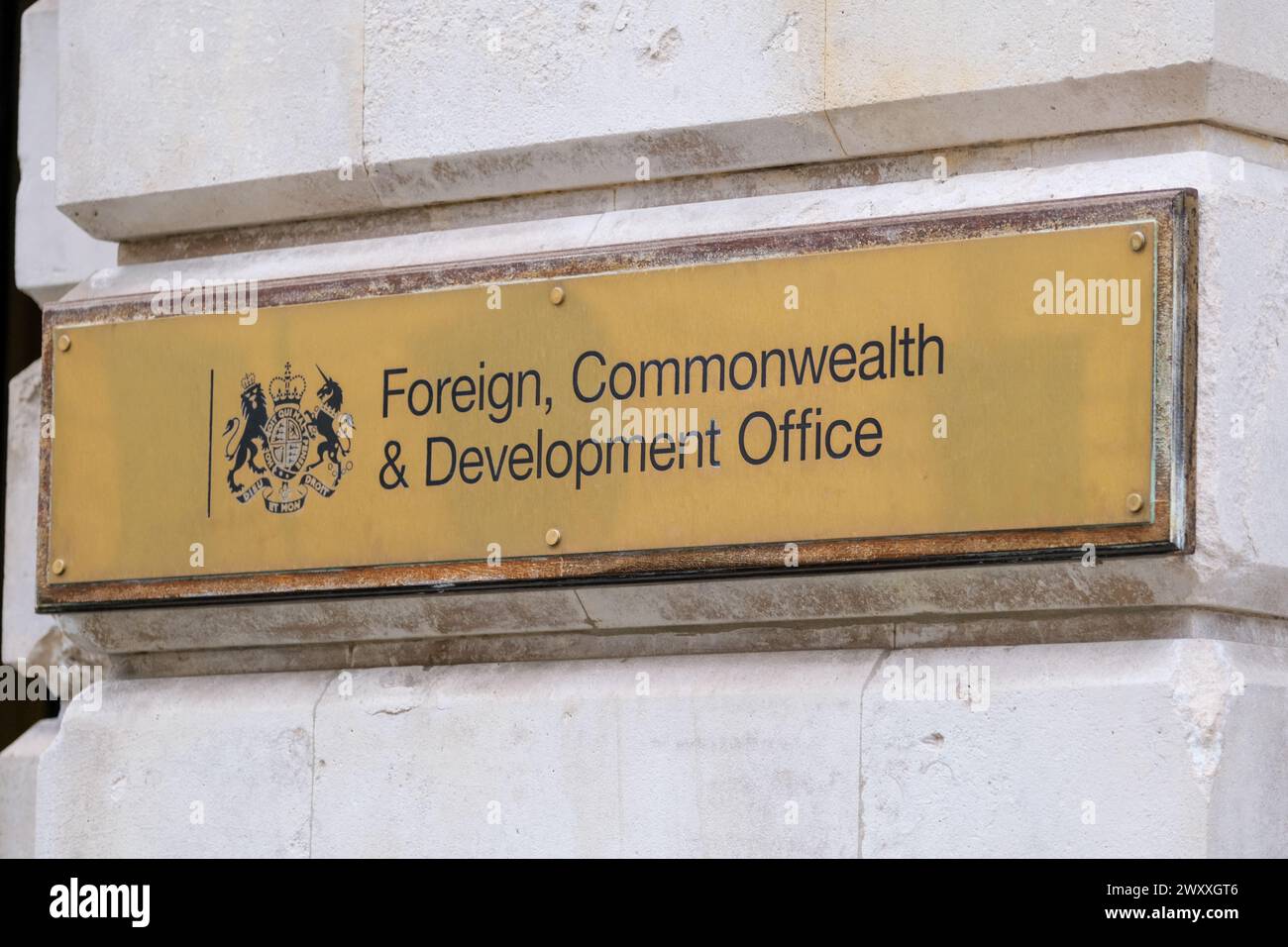 London, UK. A brass plague at the entrance of the Foreign, Commonwealth ...