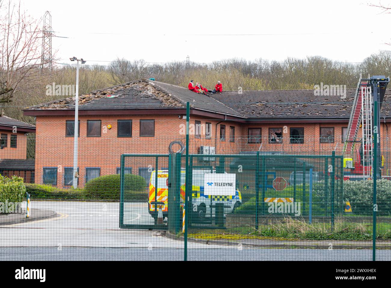Shipley, UK. 02 APR, 2024. Palestine Action sit upon heavily damaged ...