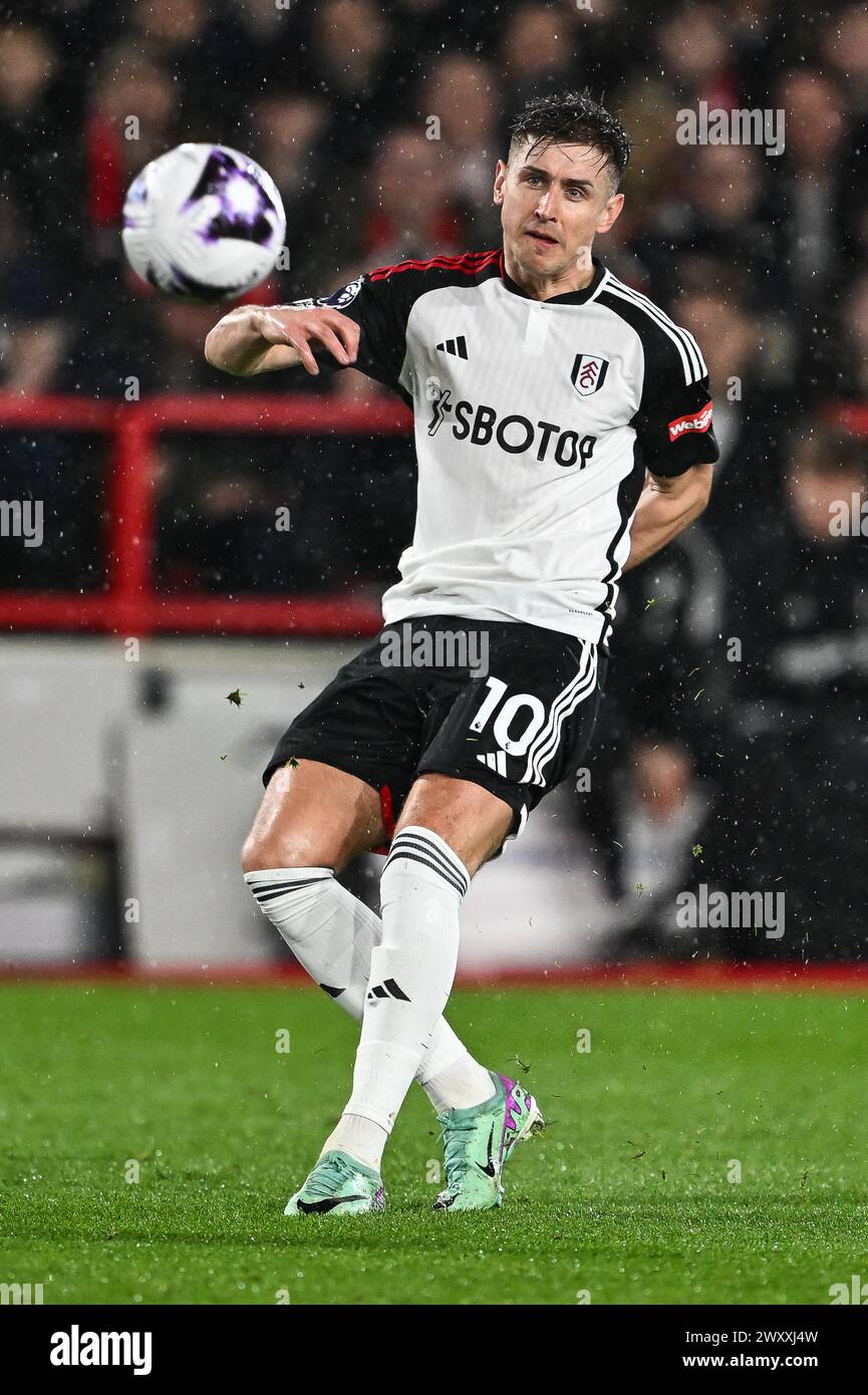 Tom Cairney of Fulham passes the ball during the Premier League match ...