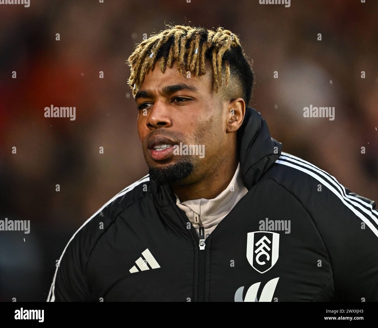 Adama Traoré of Fulham makes his way to the dugout during the Premier ...