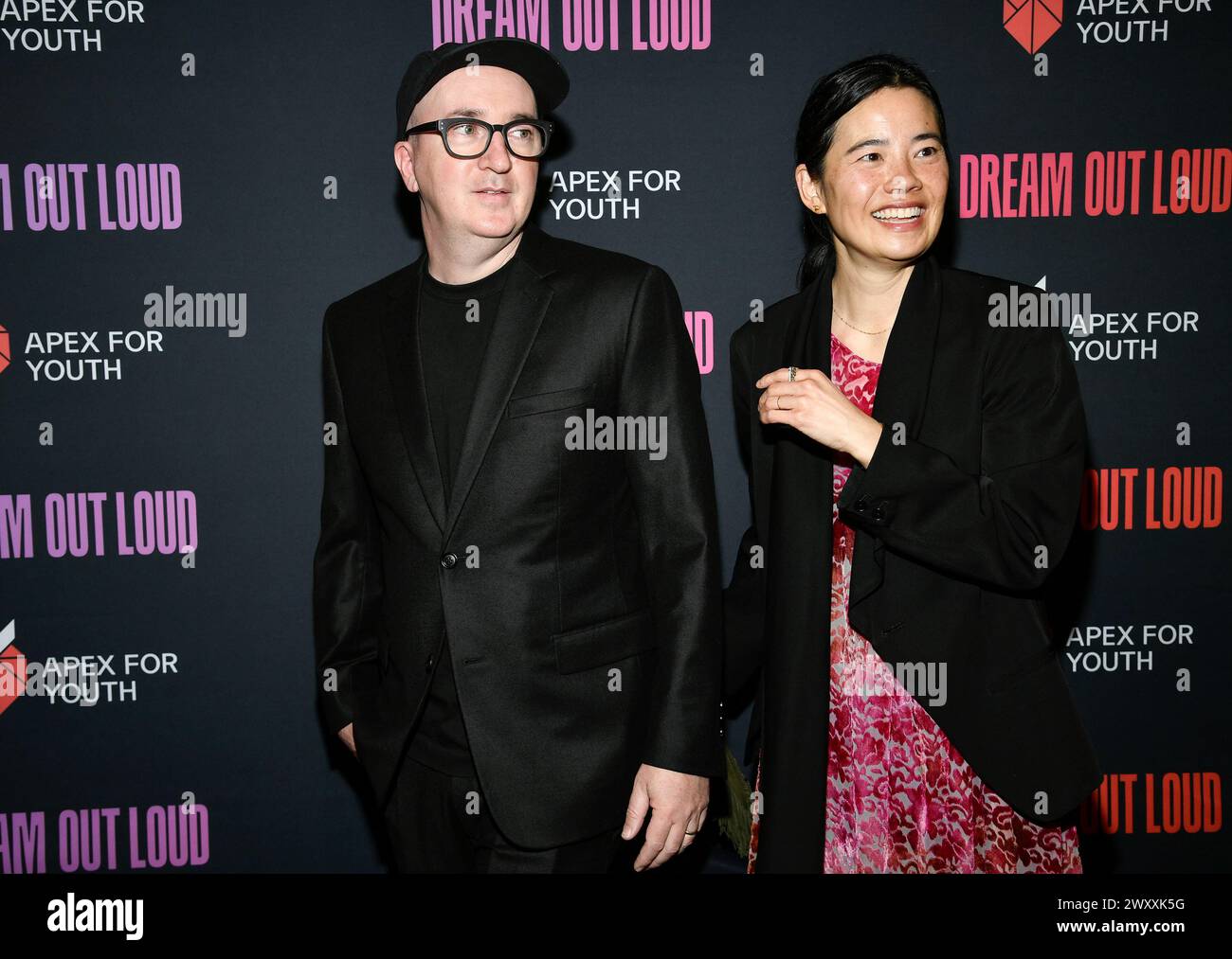 Artists Kaws, left, and wife Julia Chiang attend the Apex for Youth ...
